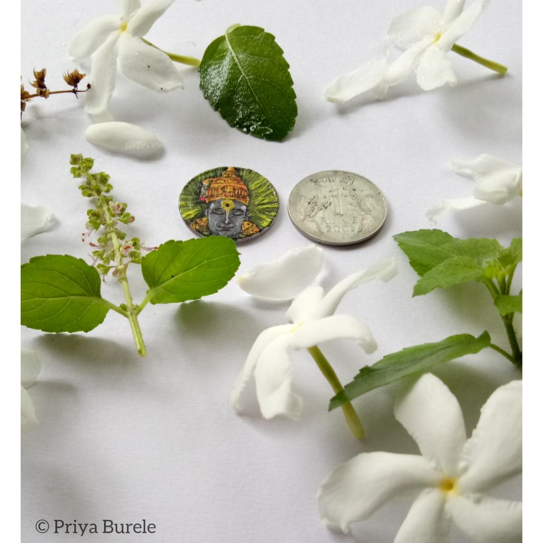 Lord Vitthal painting on a 1 rupee coin created by Priya Burele