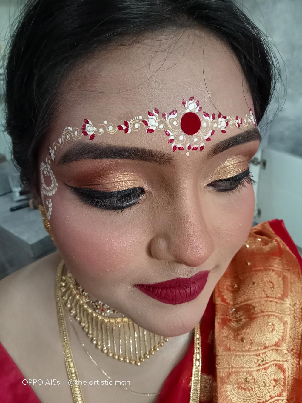 Bengali bridal chandan art created by Raja Mahajan