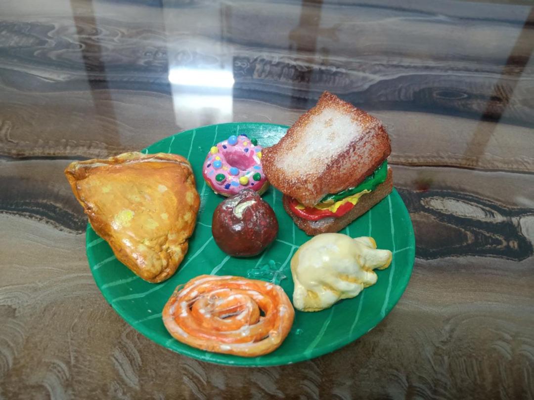 Miniature clay food created by Vishakha Parmar